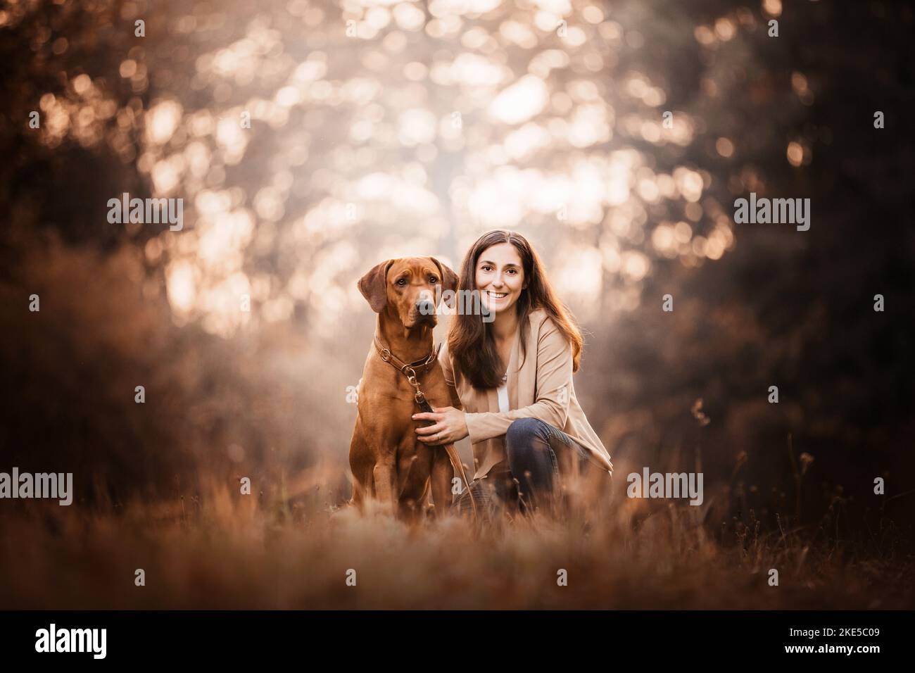 woman and Rhodesian Ridgeback Stock Photo - Alamy