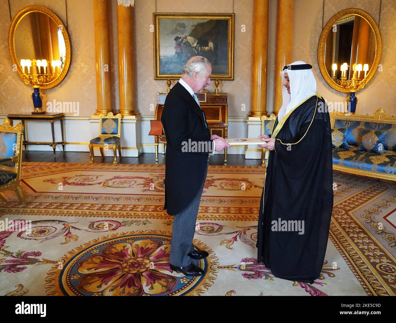 King Charles III (left) receives Bader Mohammad Al Awadi (right ...
