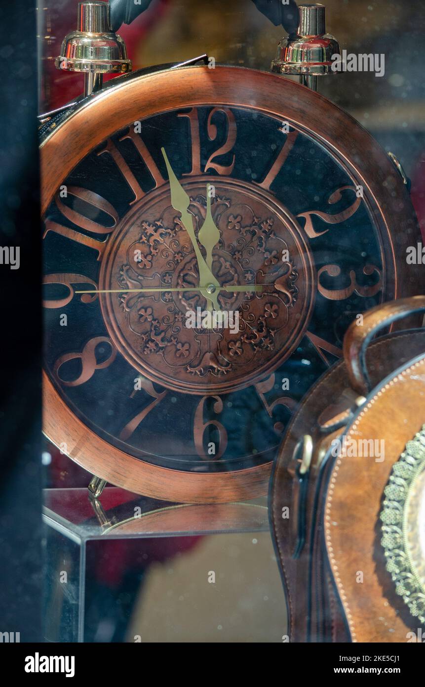 A vertical closeup of a vintage brown clock face Stock Photo - Alamy