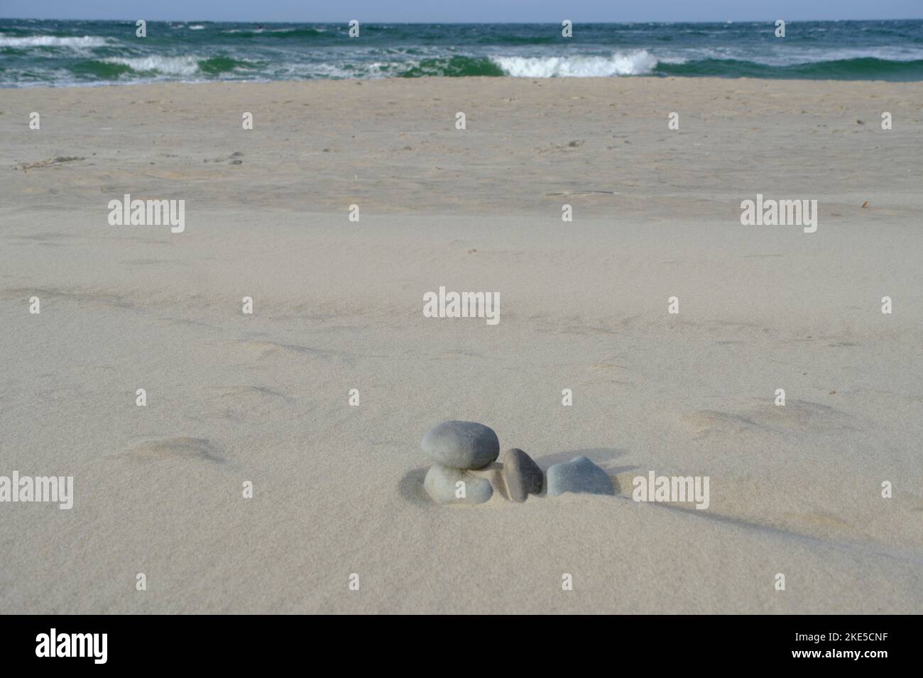 Stones are covered with quartz sand on beach during strong wind Stock ...