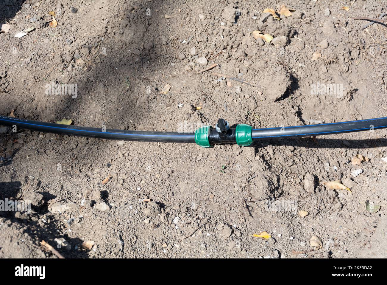 Drip irrigation ball valve. New drip irrigation system in a park before ...