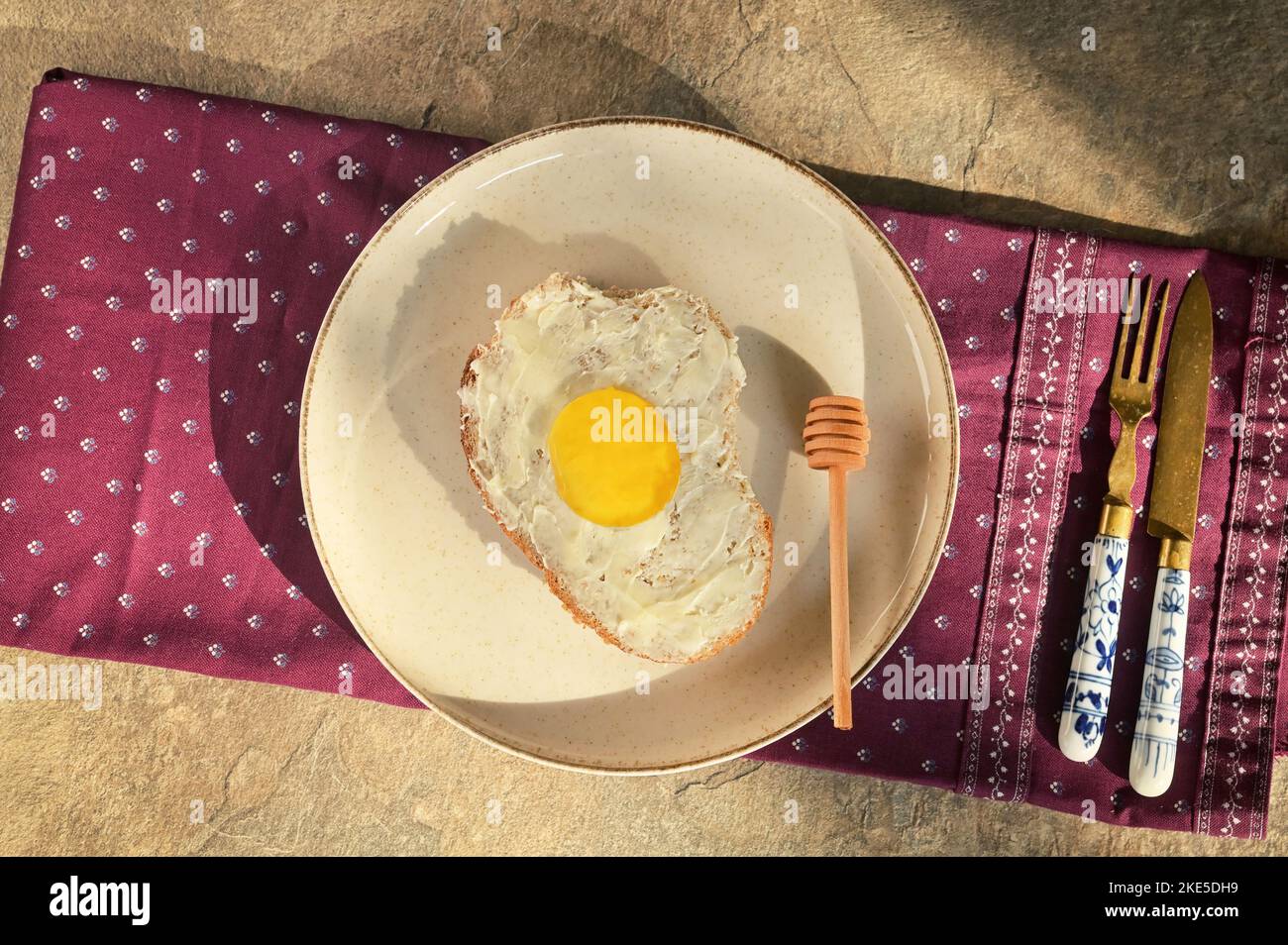 Healthy Breakfast. Abstract Fried Egg From Slice of Bread and honey ...