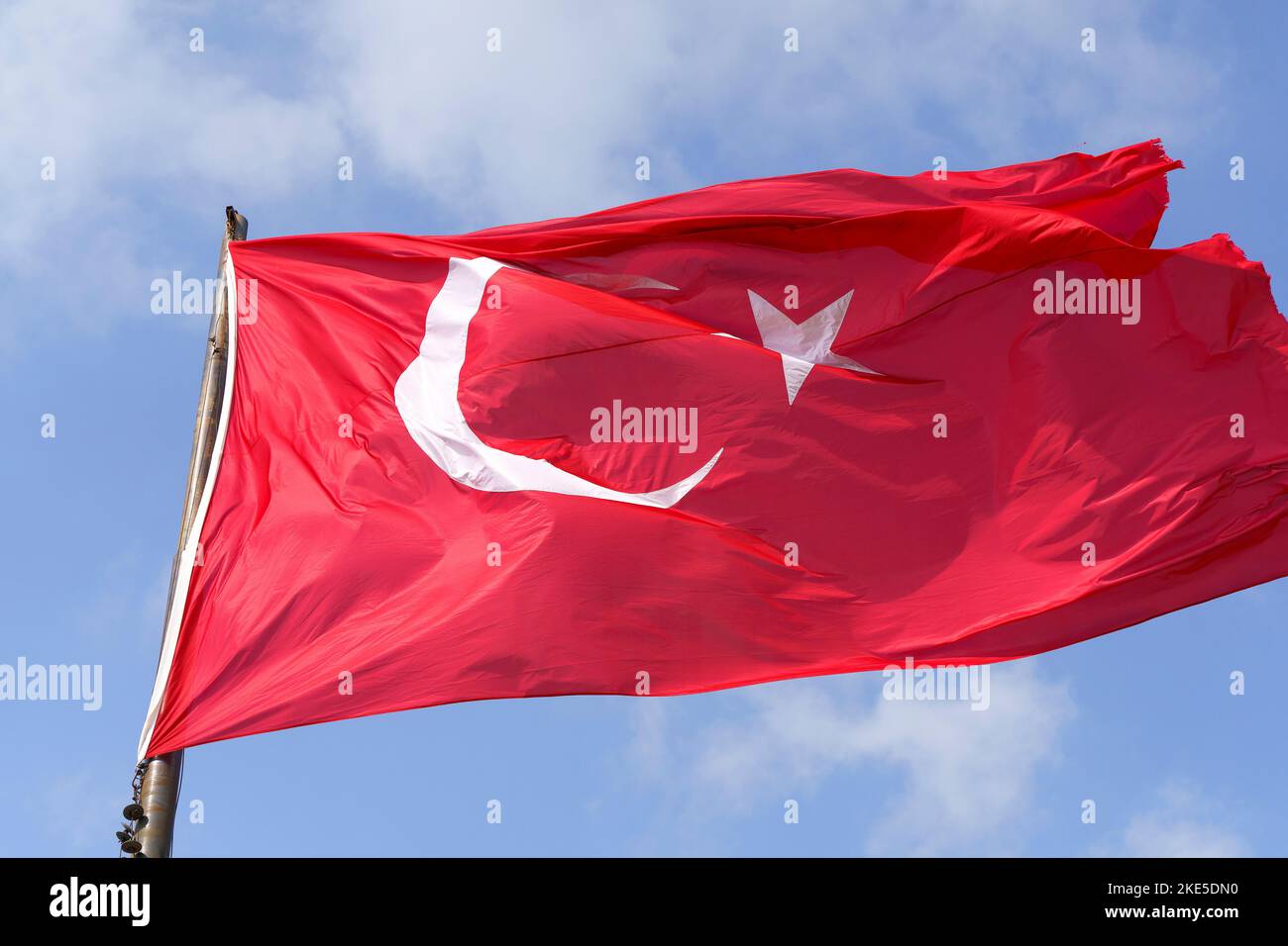 Turkish flag background. Red textile flag of Turkey on the streets of ...