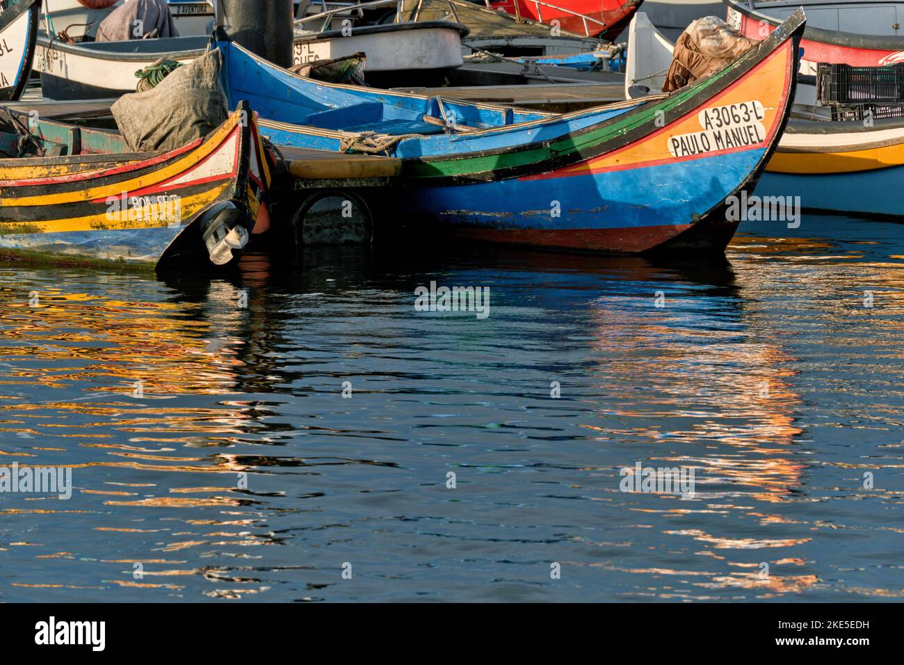 colorful typical Boats in the fishing harbor of Torreira, near Aveiro ...