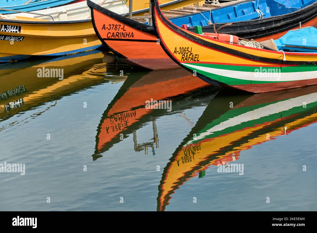 colorful typical Boats in the fishing harbor of Torreira, near Aveiro ...