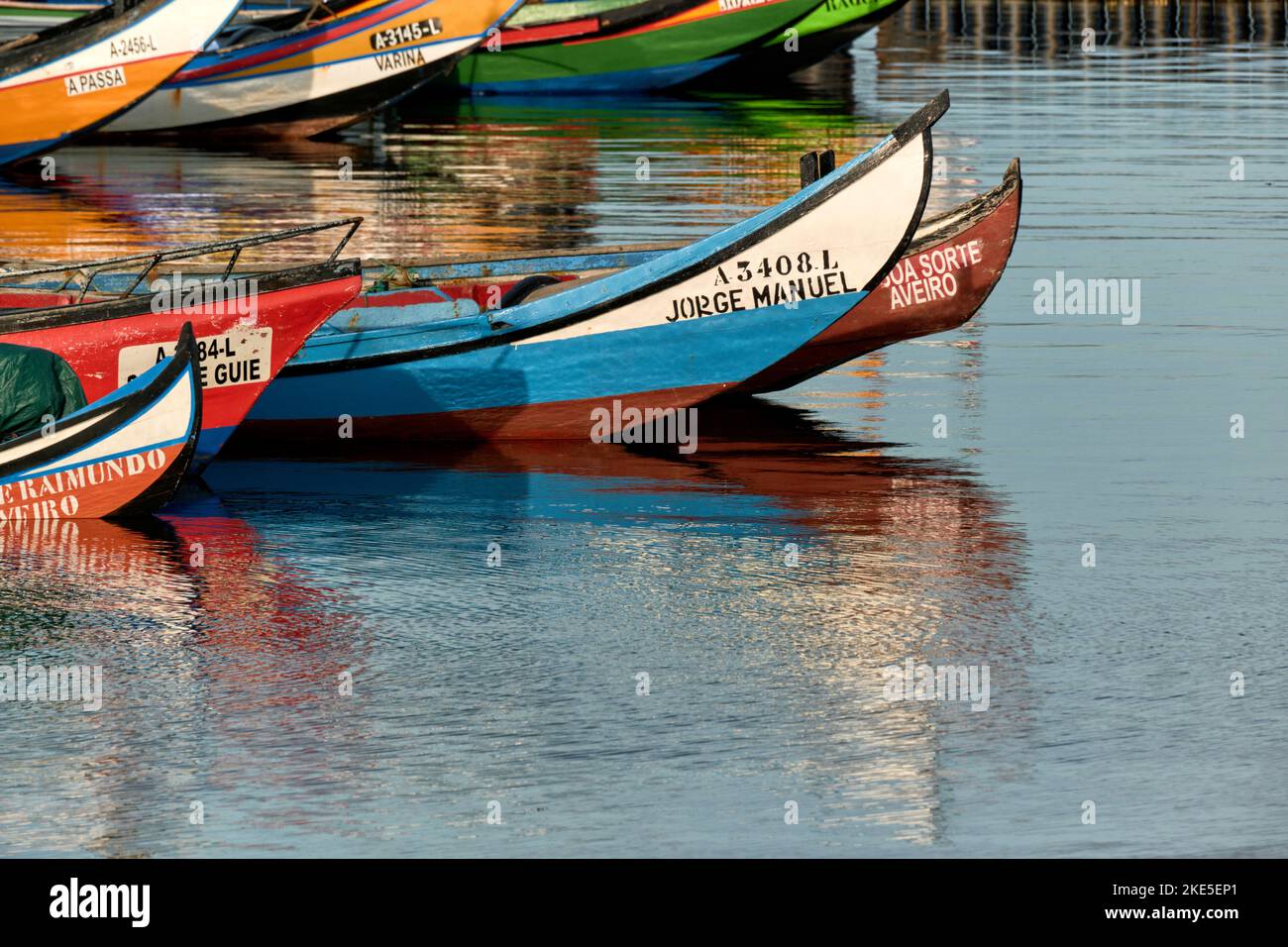 colorful typical Boats in the fishing harbor of Torreira, near Aveiro ...