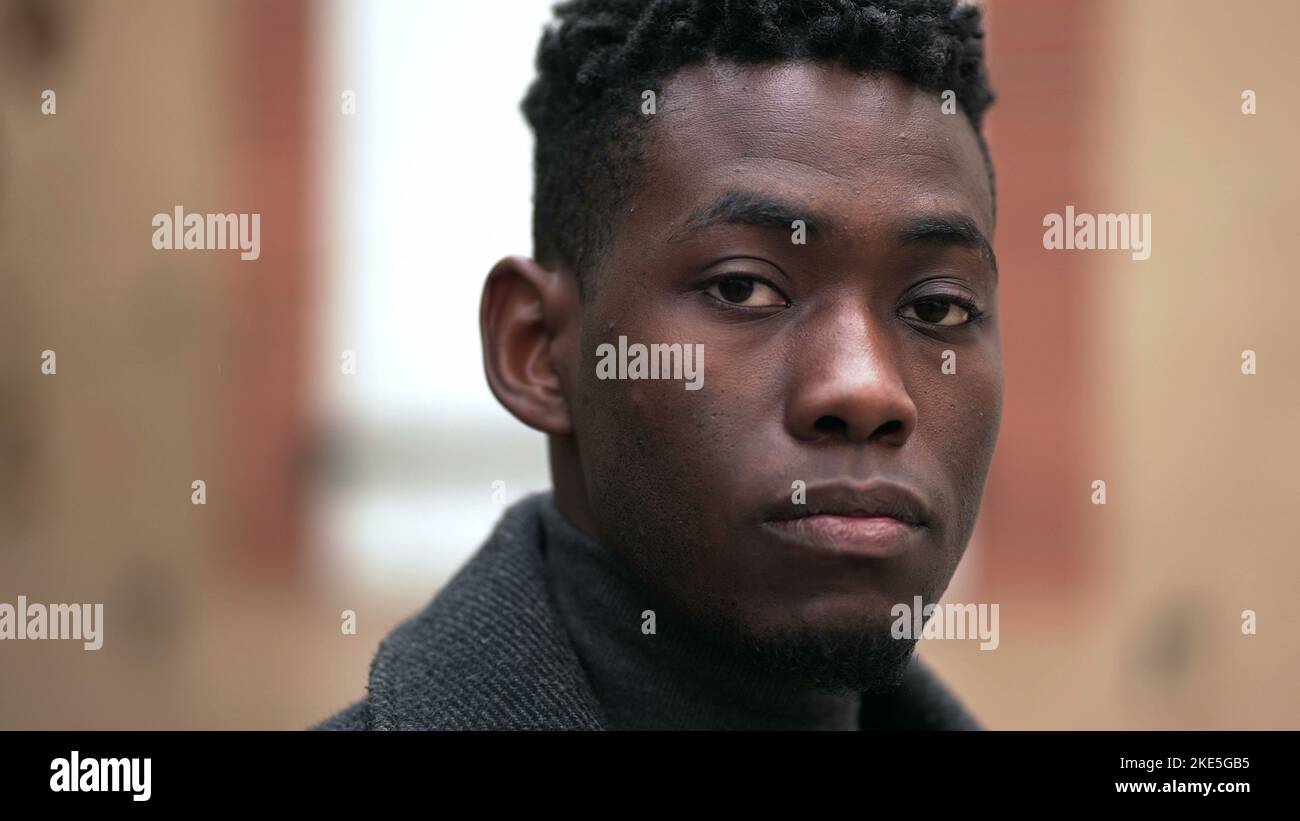 Black man staring at camera close-up face Stock Photo - Alamy