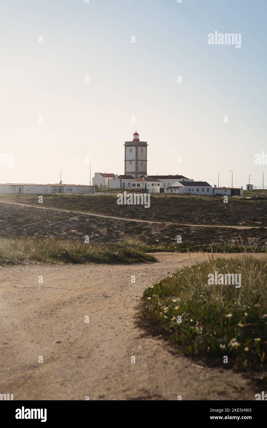 A vertical shot of a lighthouse on a sunny day in Peniche, Portugal ...