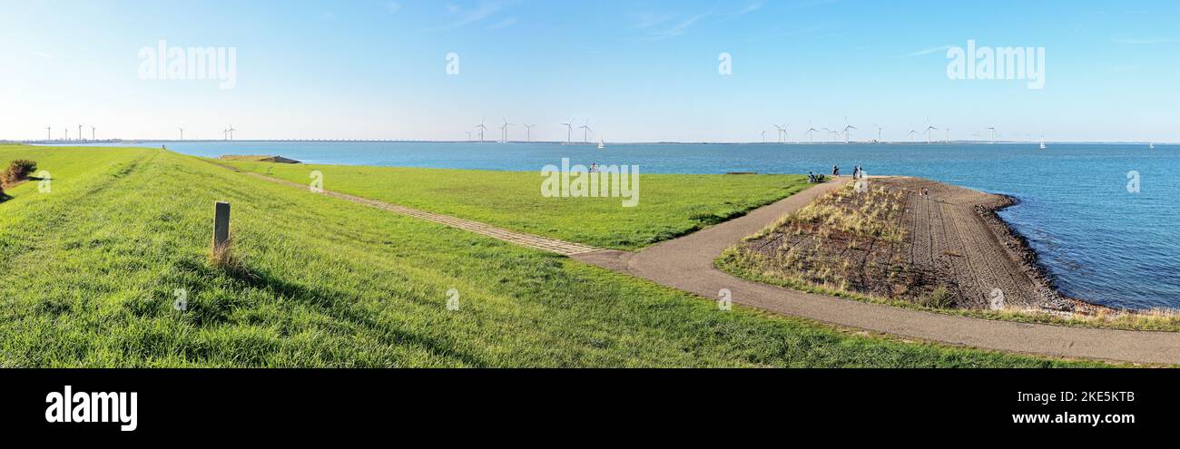 Sea defence dike along the Eastern Scheldt estuary in Zeeland province ...
