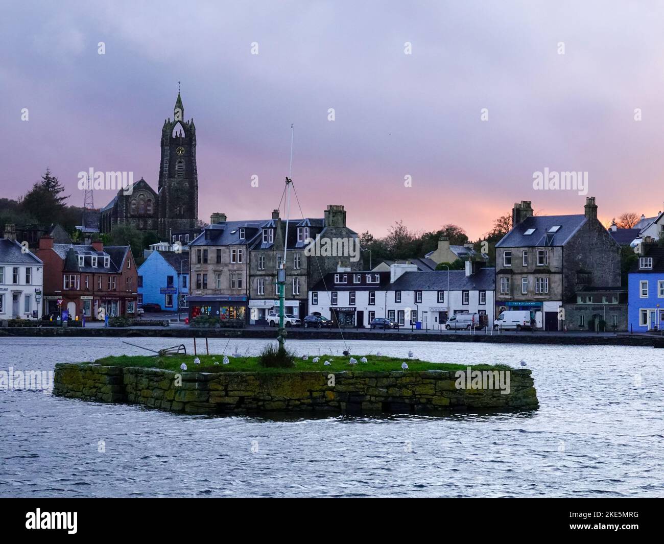Autumn sunset over the village of Tarbert, Kintyre Peninsula, Loch Fyne ...