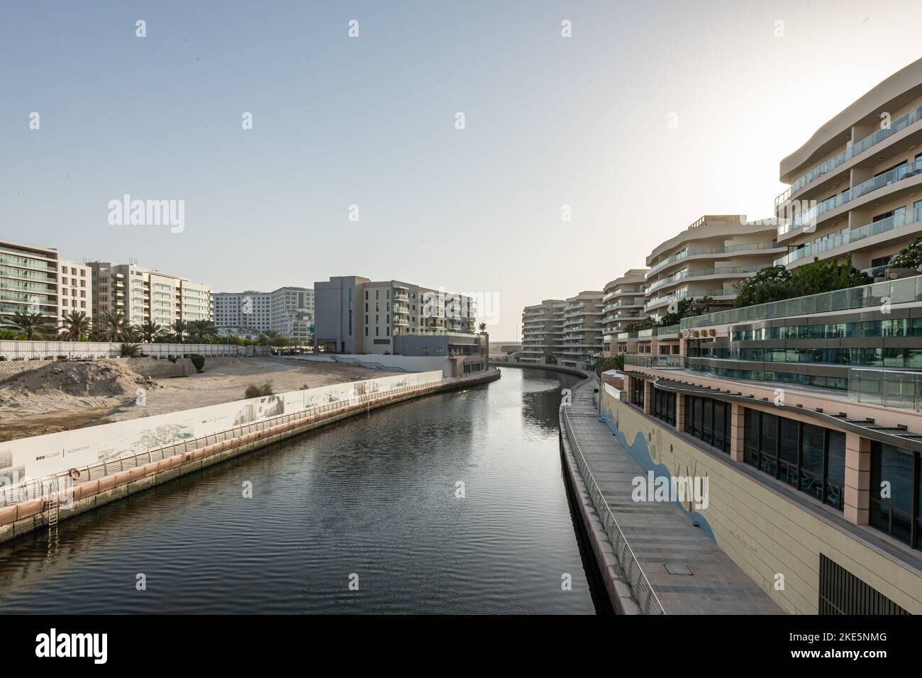 The canal and buildings in the new Al Raha Beach neighbourhood in Abu ...