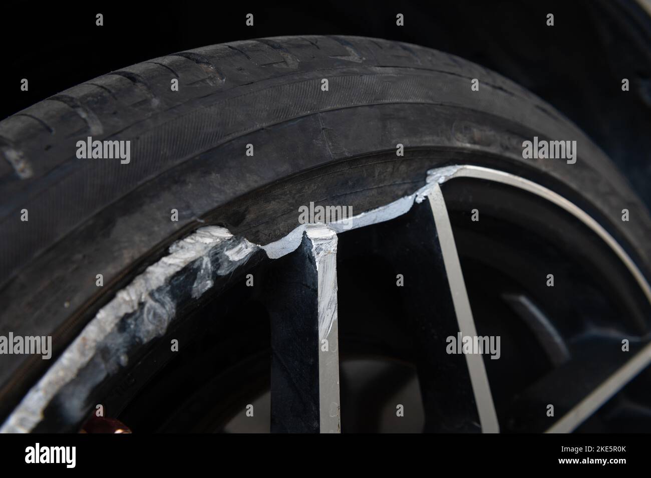 Car with damaged alloy wheels hi-res stock photography and images - Alamy