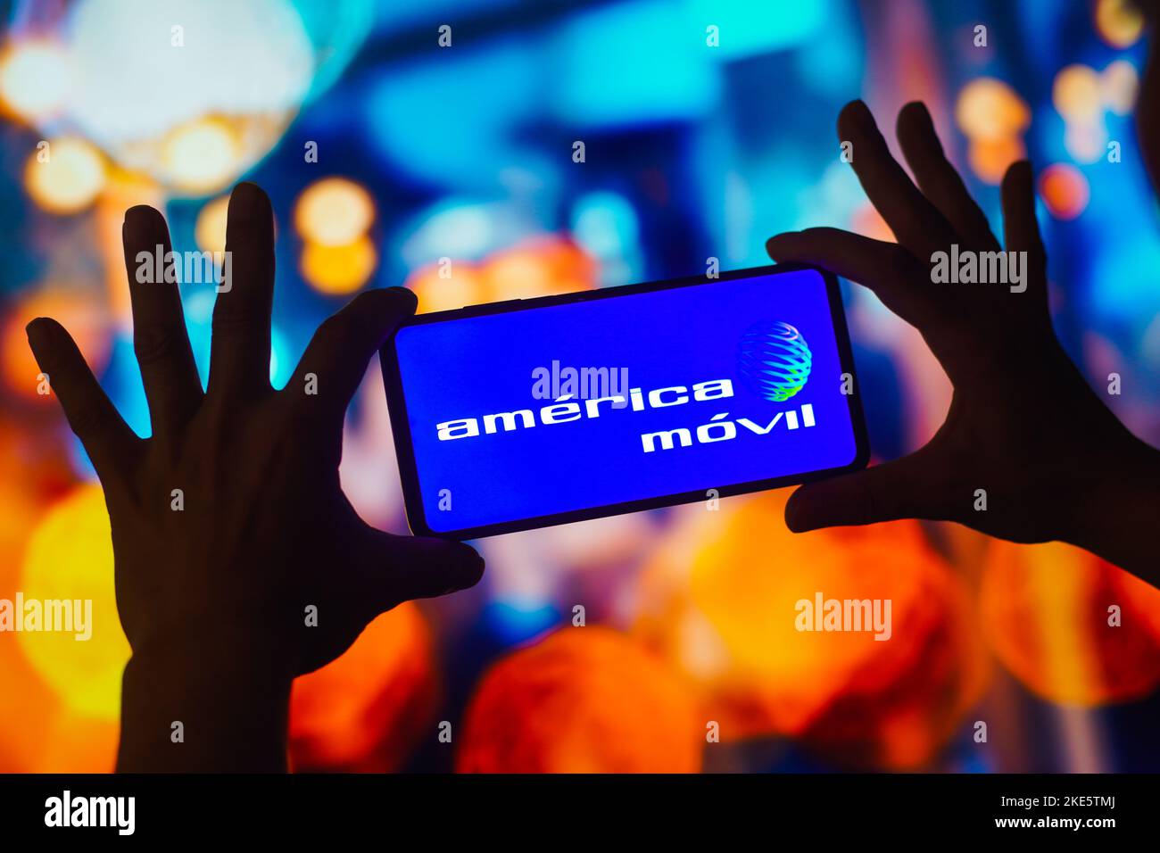 In this photo illustration, the América Móvil logo is displayed on a ...
