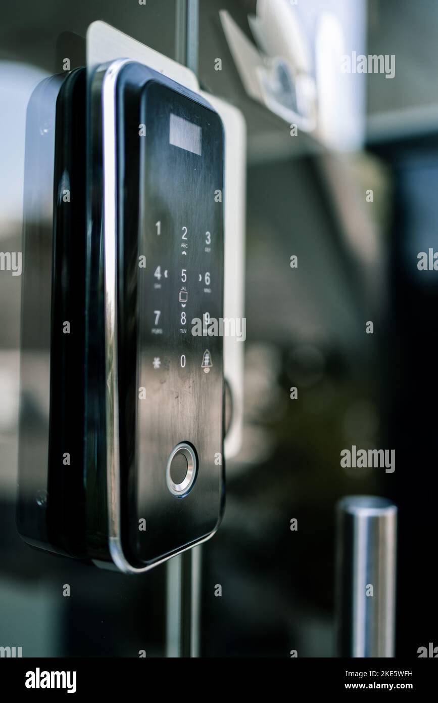 A vertical shot of a door passcode system Stock Photo - Alamy