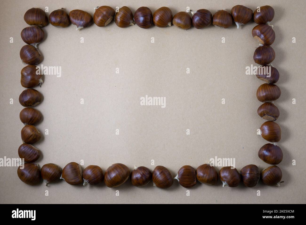 square frame made up of chestnuts placed in a row Stock Photo - Alamy