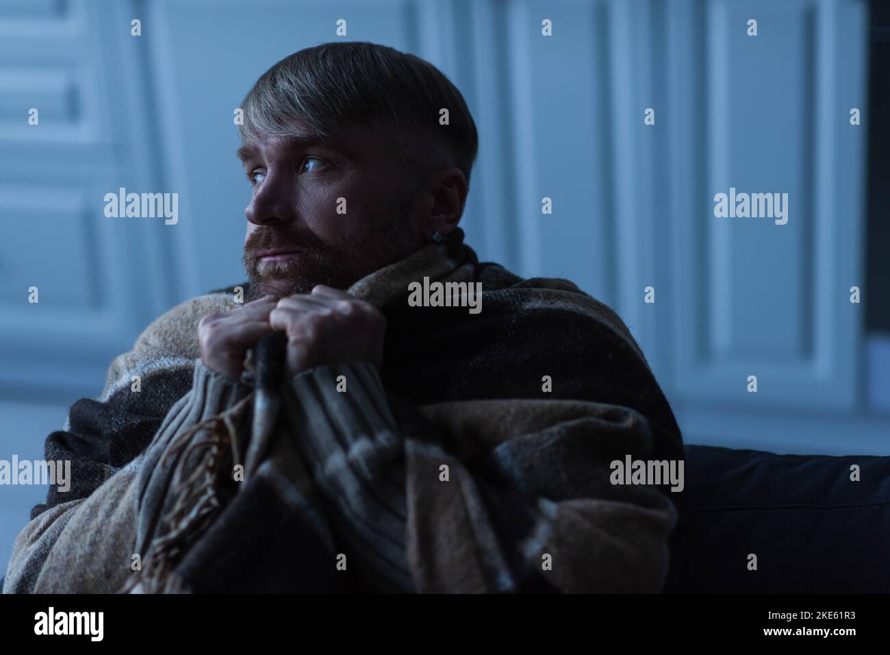 Upset frozen man sitting hi-res stock photography and images - Alamy