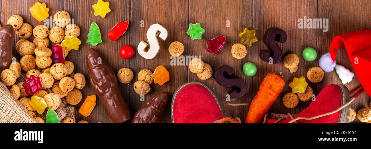 Sinterklaas, Saint Nicholas day background. Little kid red shoe with ...