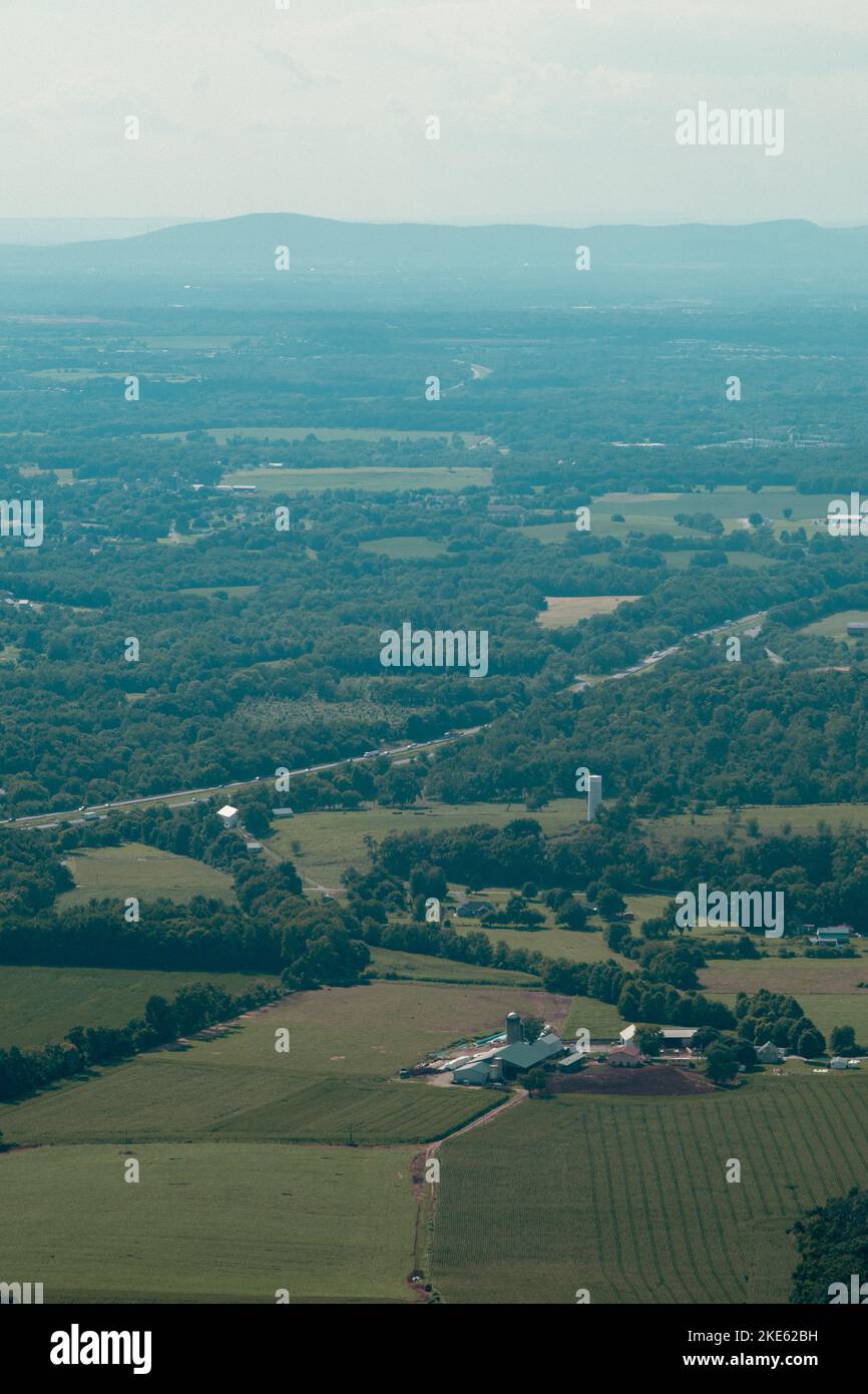 A vertical aerial view of the black rock cliff Stock Photo - Alamy