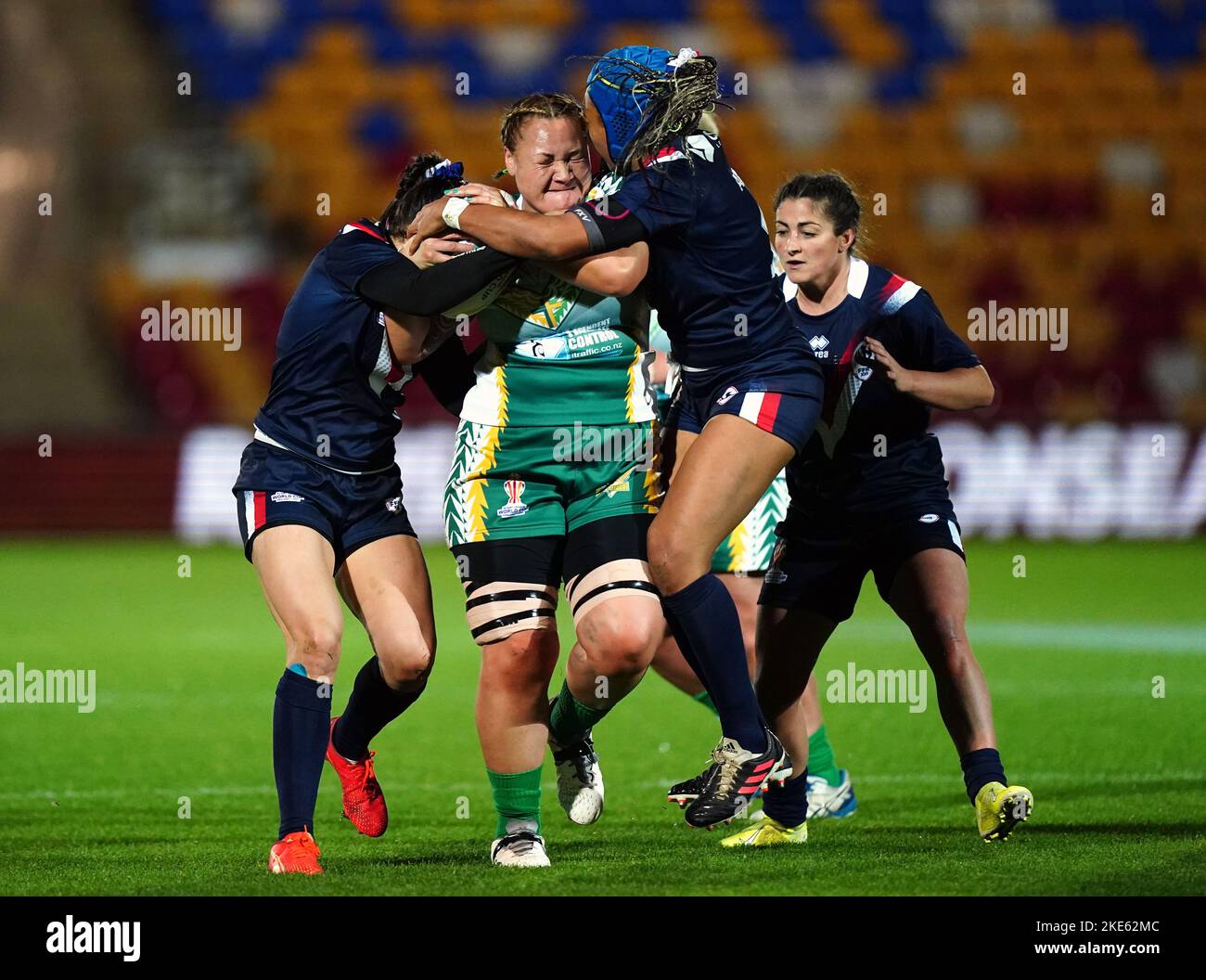 Cook Islands' Toka Natua tackled by France's Alice Varela and Elisa ...