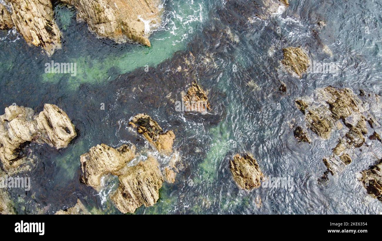Aerial photo. Drone point of view. A lot of boulders in the sea water ...