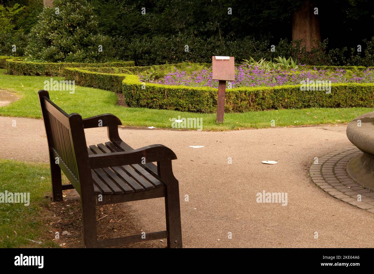 Gardens, Lauderdale House, Highgate, London, UK. Bench, trees, flowers ...