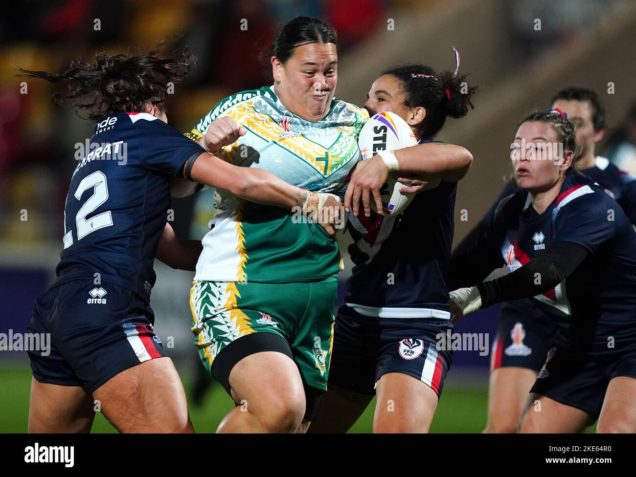 Cook Islands' Terehia Matua scores their side's second try of the game during the Women's Rugby ...