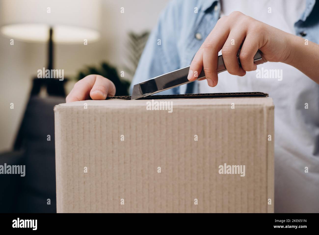 Woman consumer cutting order box hi-res stock photography and images ...