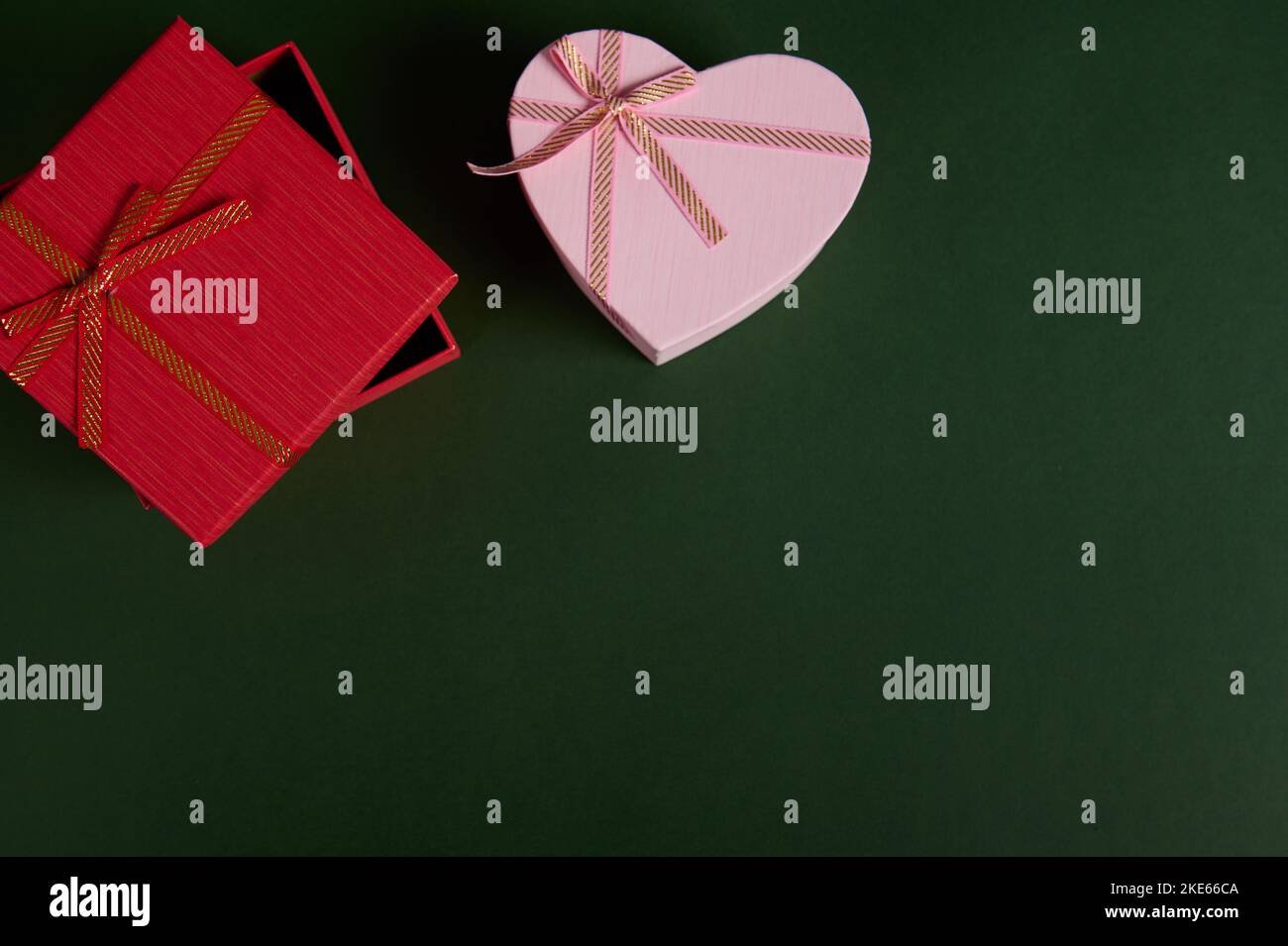 Cute red and pink gift boxed with romantic surprises and presents for ...