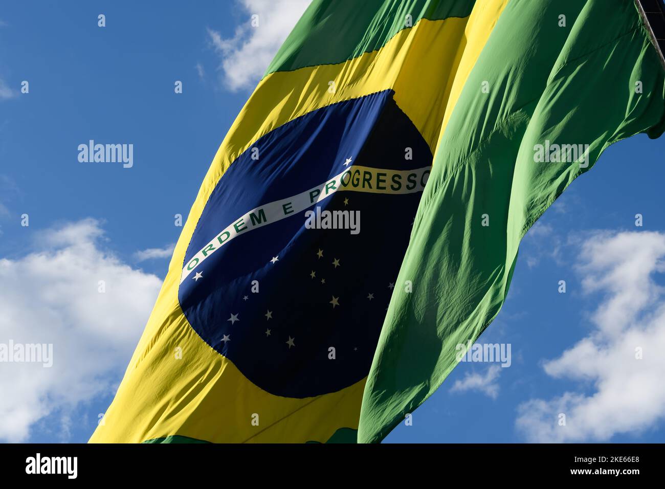 Close up on a Brazilian flag waving on a beautiful sunny day, with the ...