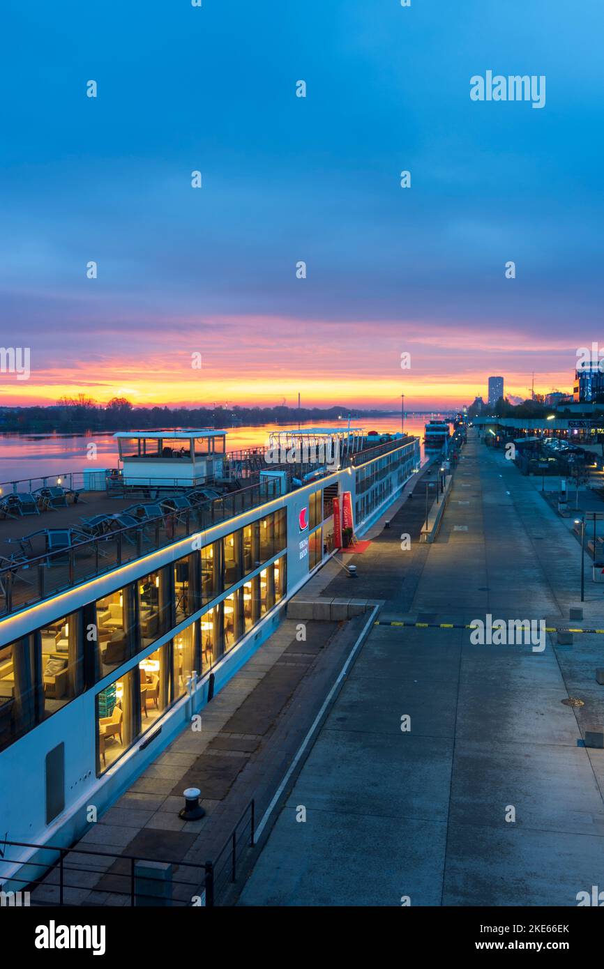 Wien, Vienna: river Donau (Danube) at sunrise, cruise ship at dock at ...