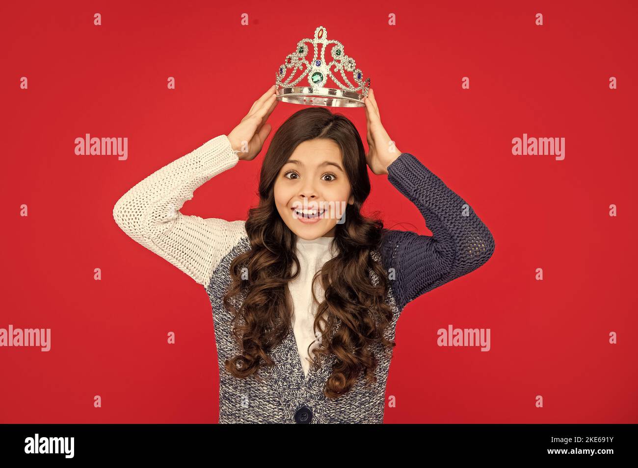 amazed child in queen crown. surprised princess in tiara. portrait of ...