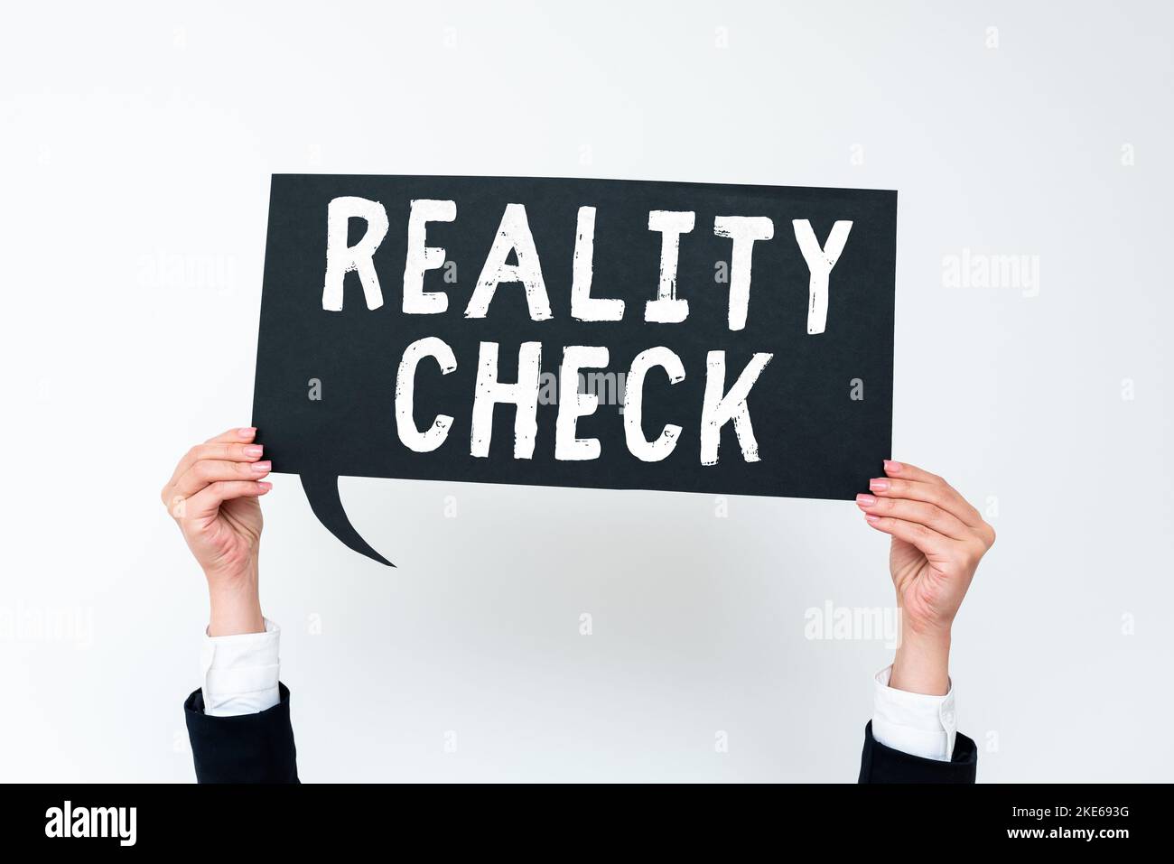 Text caption presenting Reality Check. Conceptual photo making the ...
