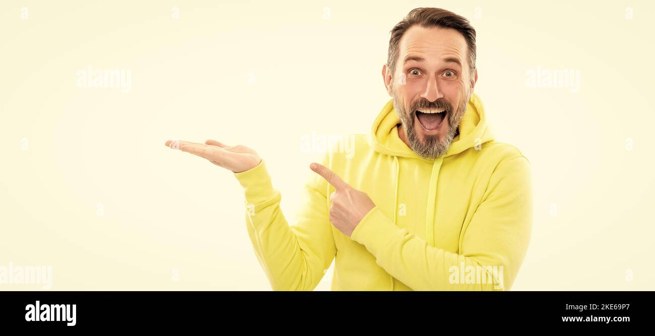 Man face portrait, banner with copy space. handsome mature man in hoody ...