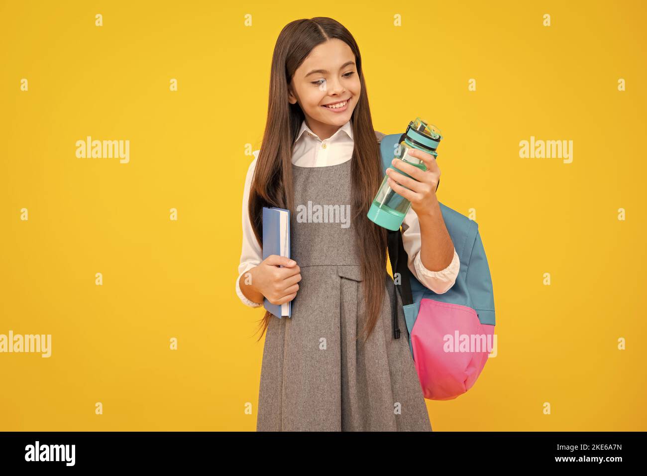 Girl wearing backpack school hi-res stock photography and images - Alamy