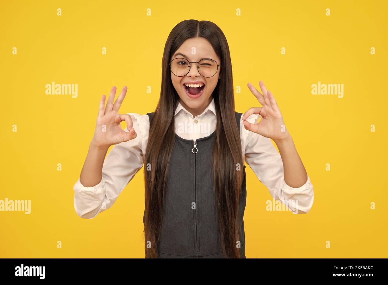 Okay. Young girl child show fingers ok symbol sign language isolated on ...