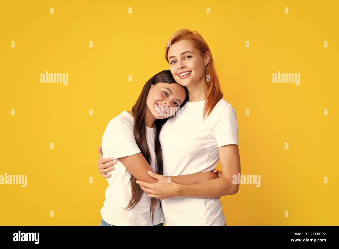 Mom embracing daughter hi-res stock photography and images - Alamy