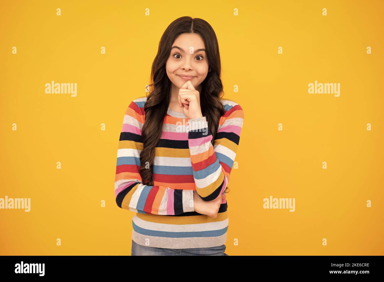 Doubtful thoughtful teenager child girl dreaming, imagining something ...