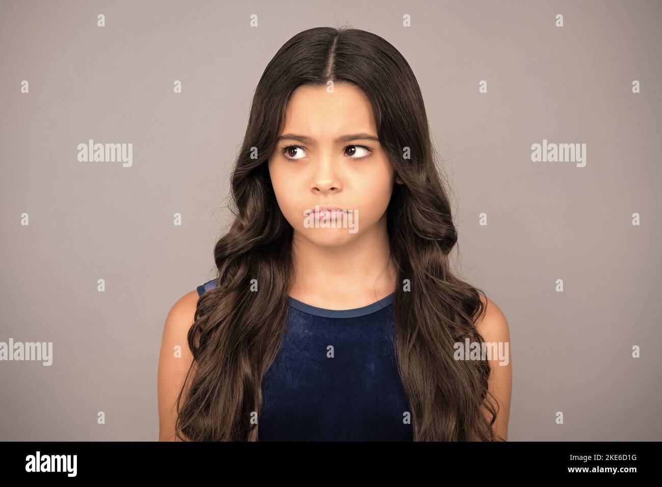 Angry teenager girl, upset and unhappy negative emotion. Little kid ...