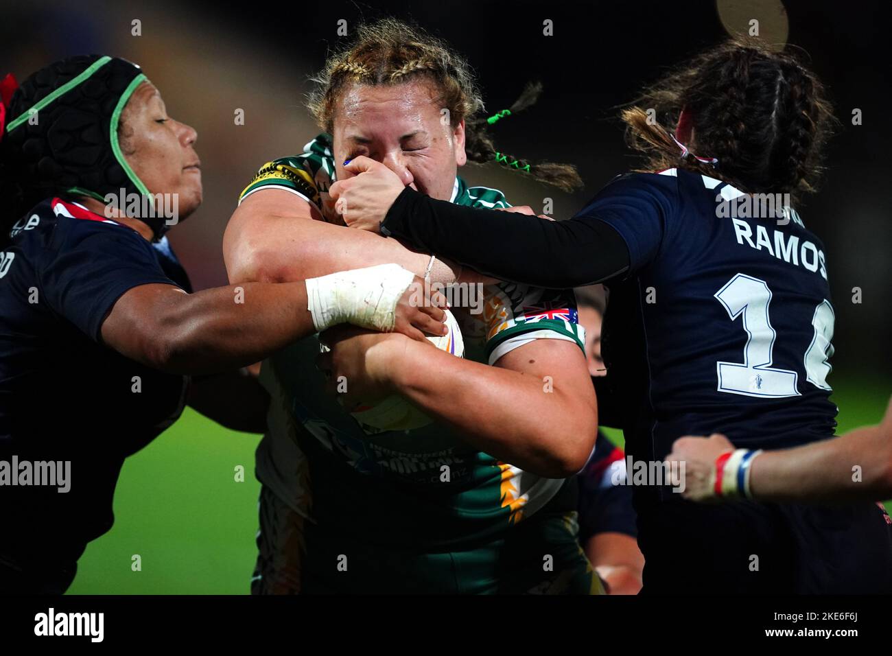 Cook Islands' Elianna Walton tackled by France's Cyndia Mansard and ...