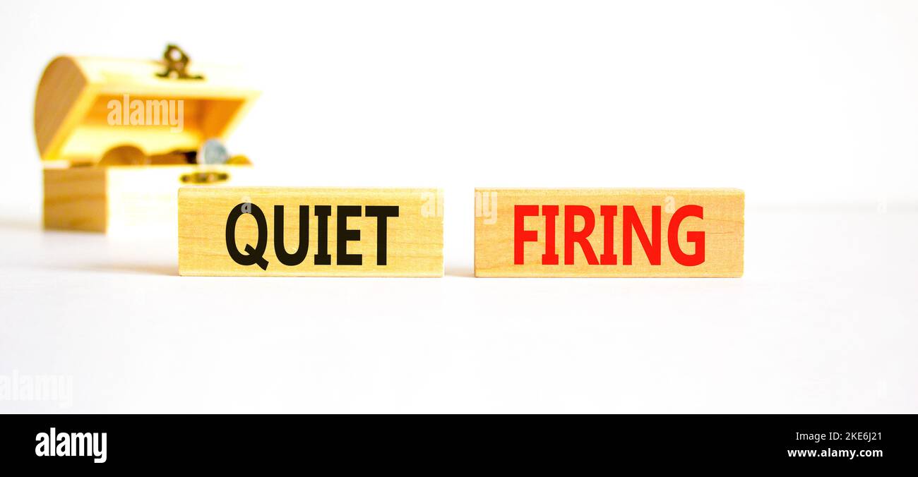 Quiet firing symbol. Concept words Quiet firing on wooden blocks ...