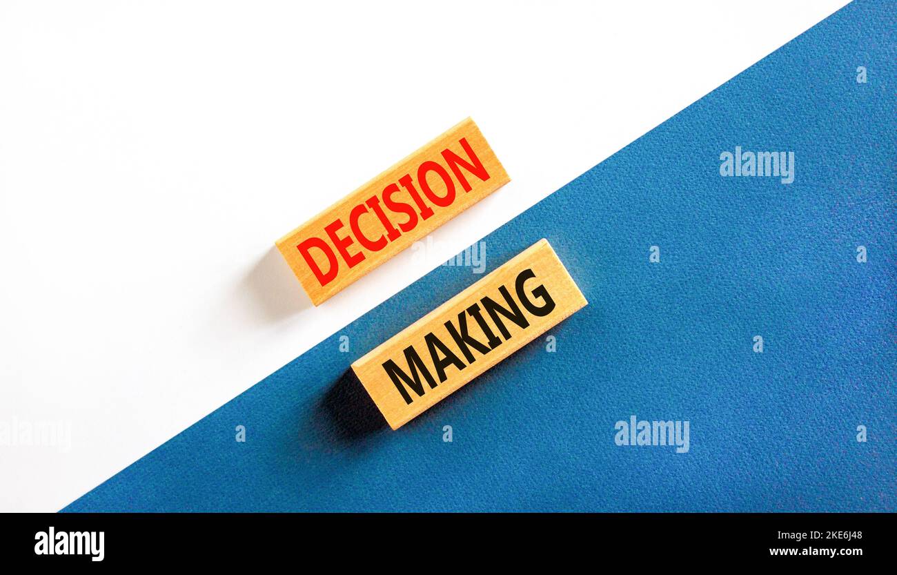 Decision making symbol. Concept words Decision making on wooden blocks ...