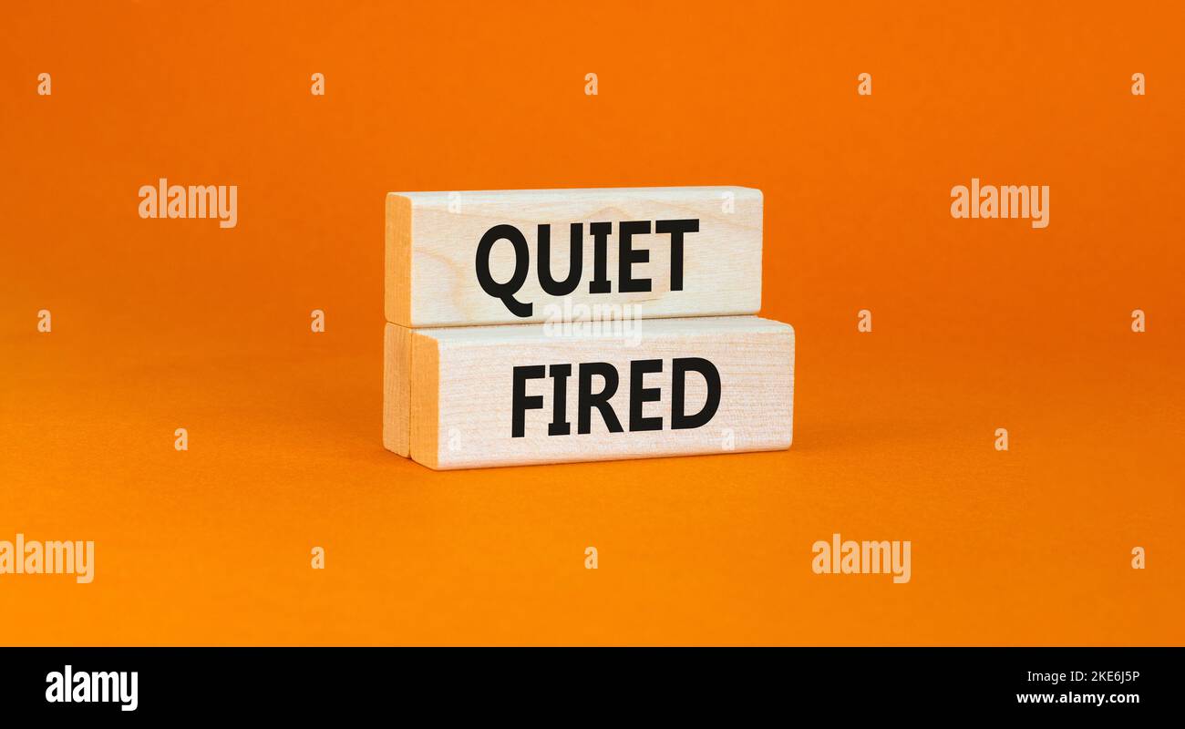 Quiet fired symbol. Concept words Quiet fired on wooden blocks ...