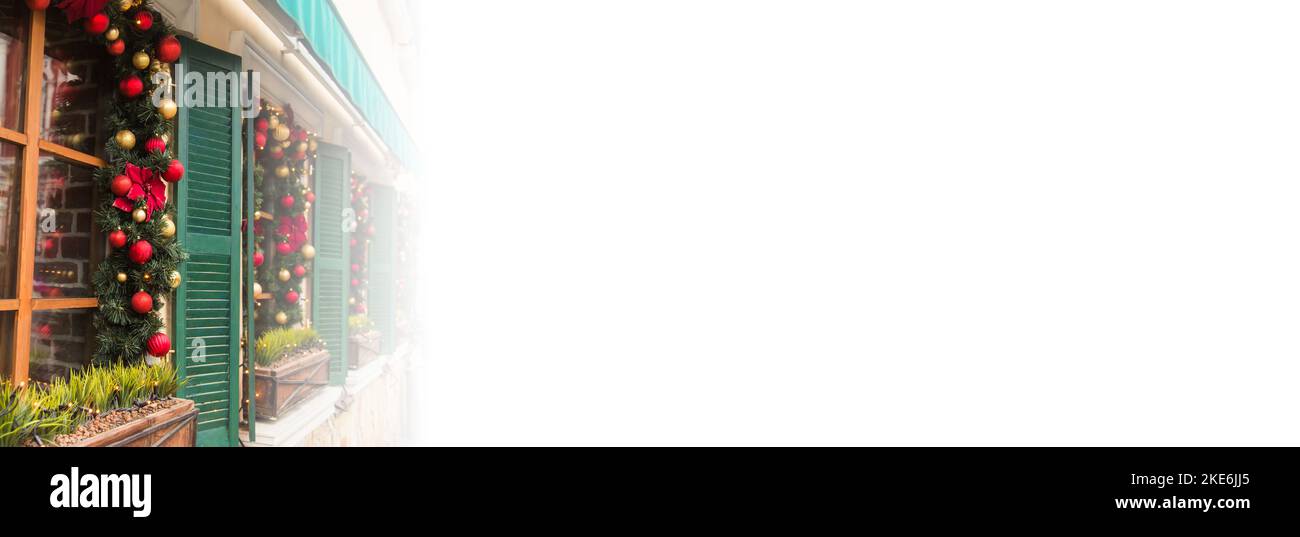 Banner Christmas Red ball decorated windows on vintage house with copy ...