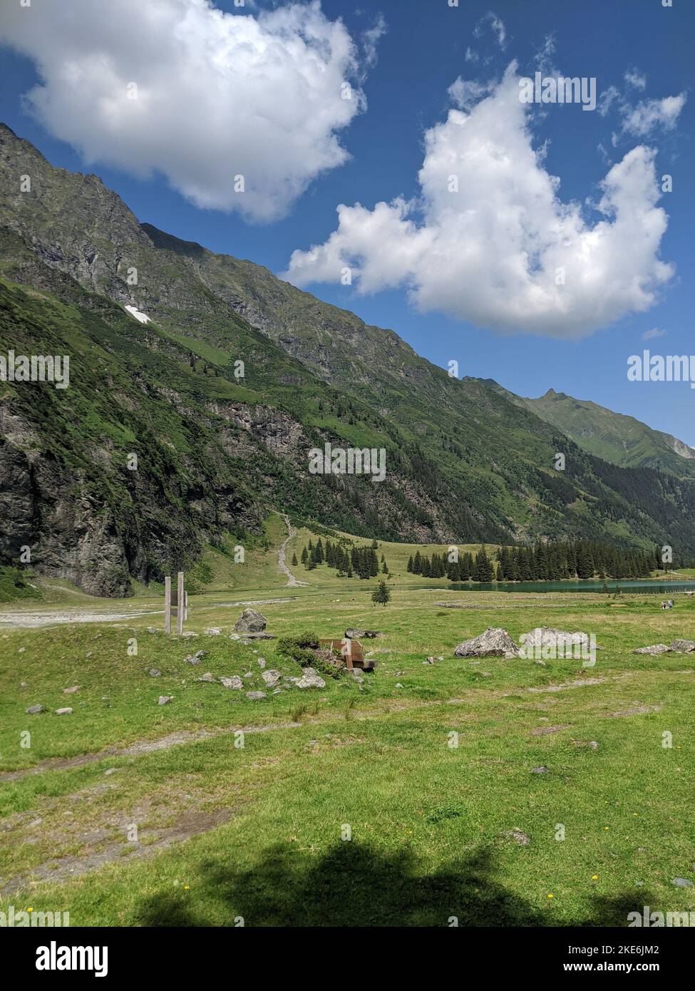 A Beautiful mountainous landscape with green grass on a sunny day Stock ...