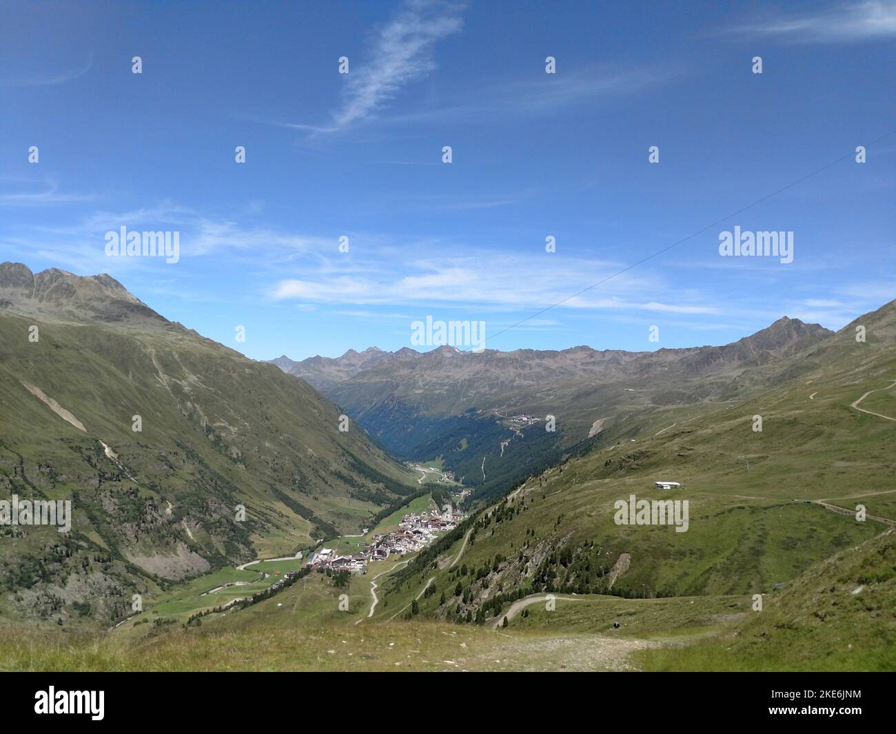 A Beautiful mountainous landscape with green grass on a sunny day Stock ...