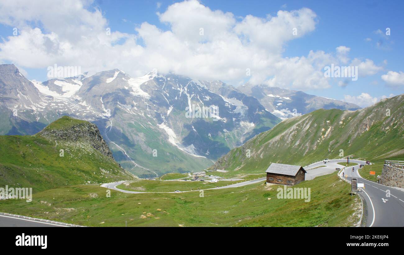 A beautiful mountainous landscape with green grass on a sunny day Stock ...