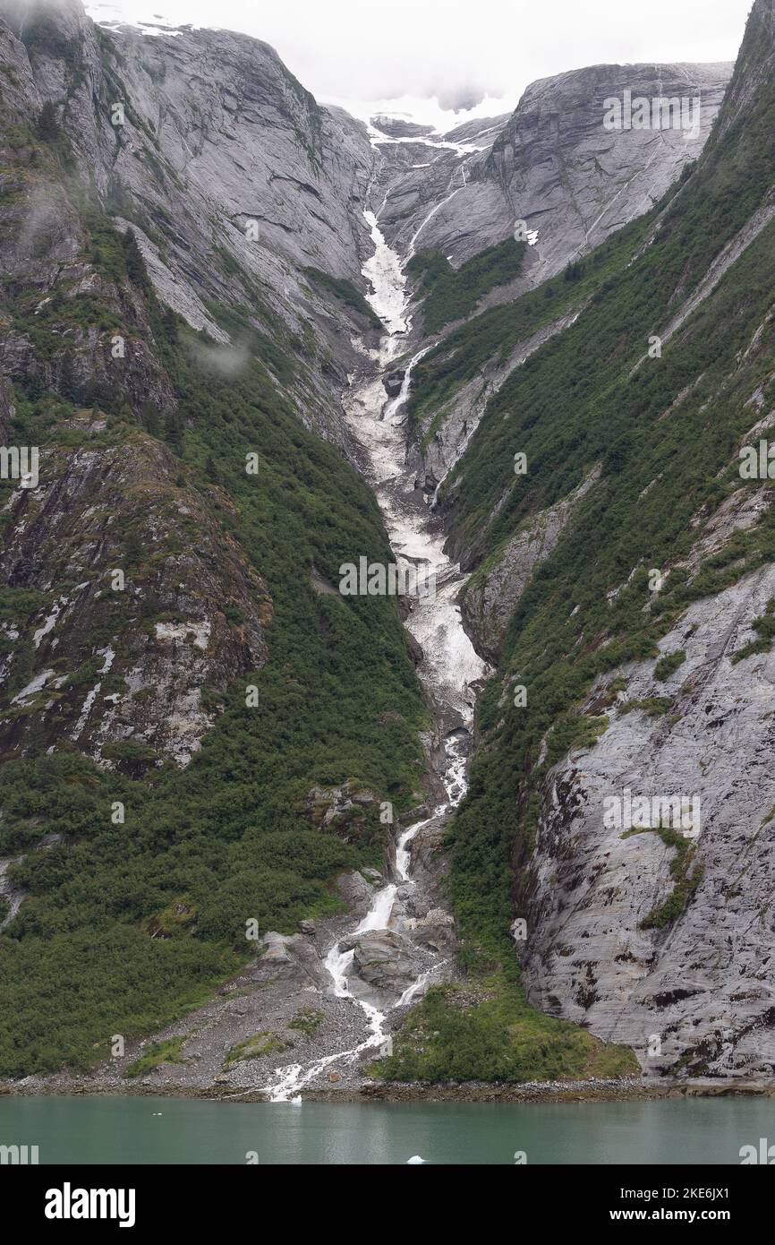 A landscape scene of the Alaska green mountain with snowy glacier Stock ...