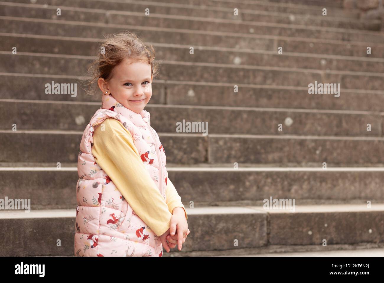 Kids sitting on a step hi-res stock photography and images - Alamy