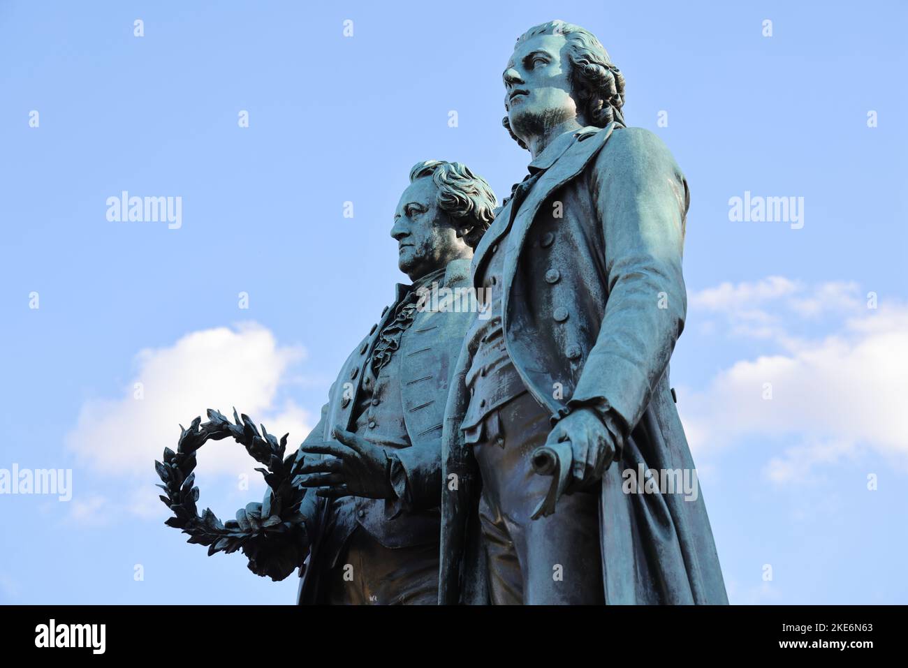 A closeup of Goethe-Schiller-Denkmal monument on blue cloudy sky ...