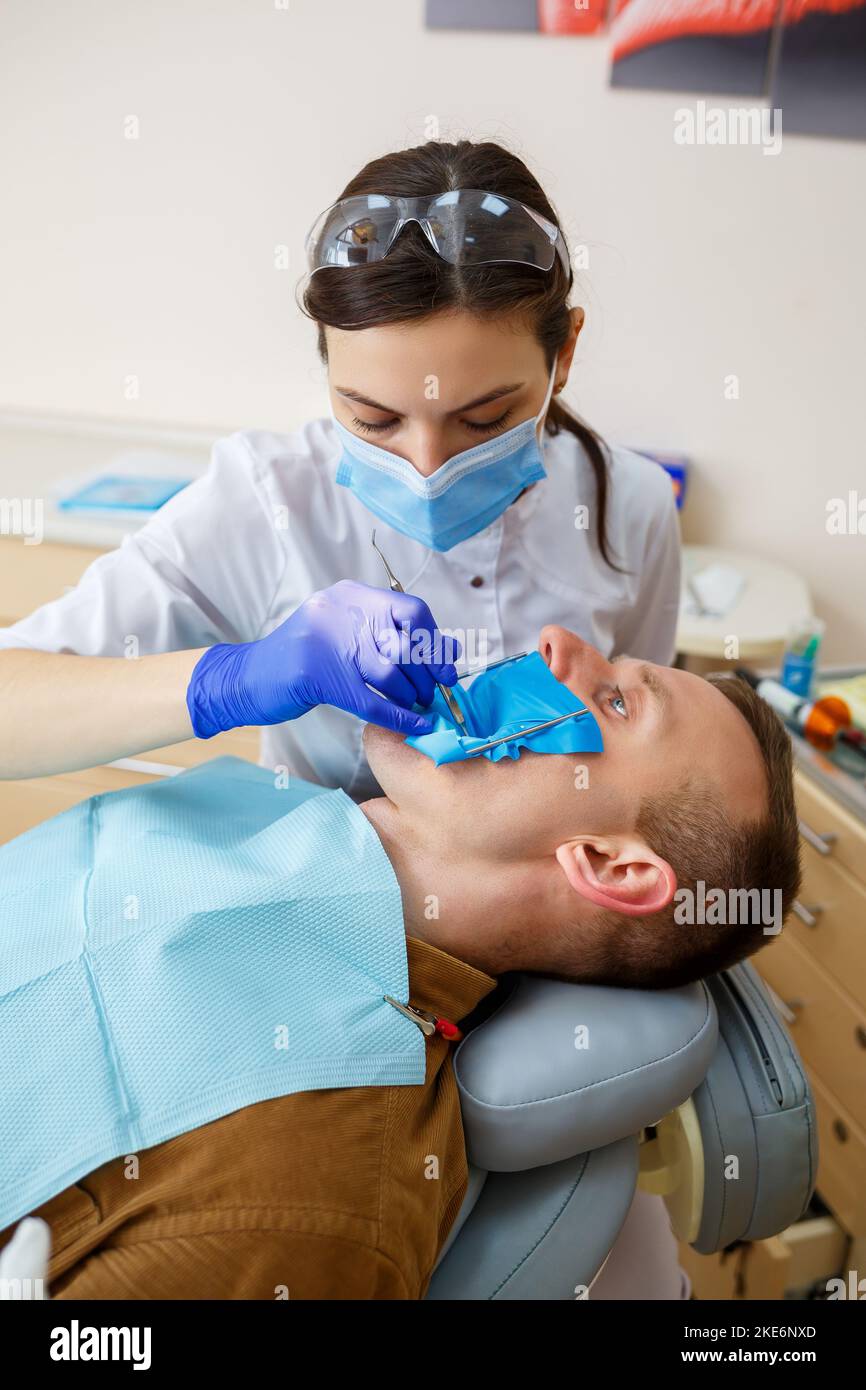 Inspecting teeth in mirror hi-res stock photography and images - Alamy